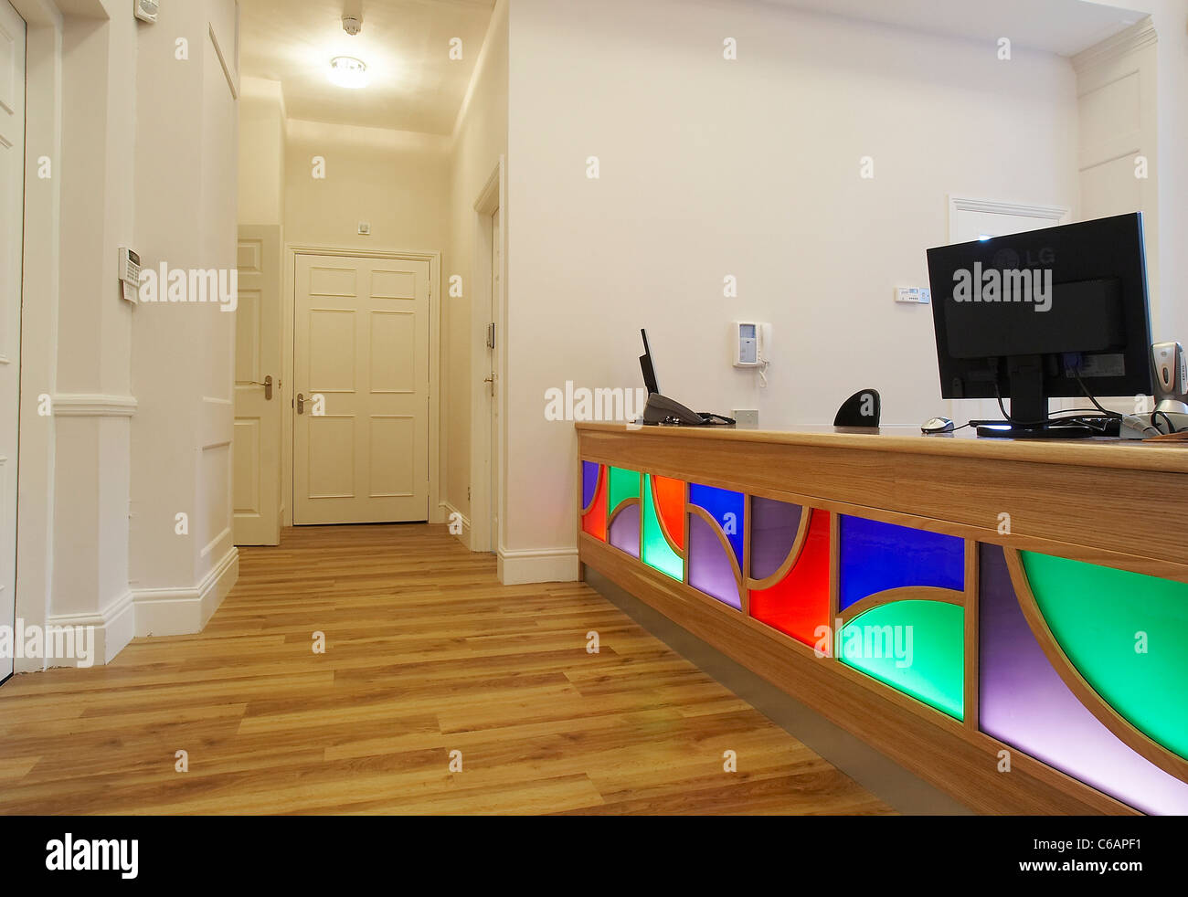 Empty reception desk at a dental surgery Stock Photo - Alamy
