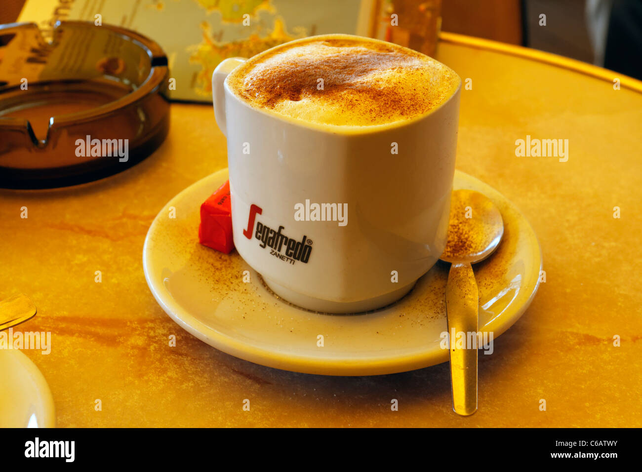 A cup of coffee on the table of a bar Stock Photo - Alamy