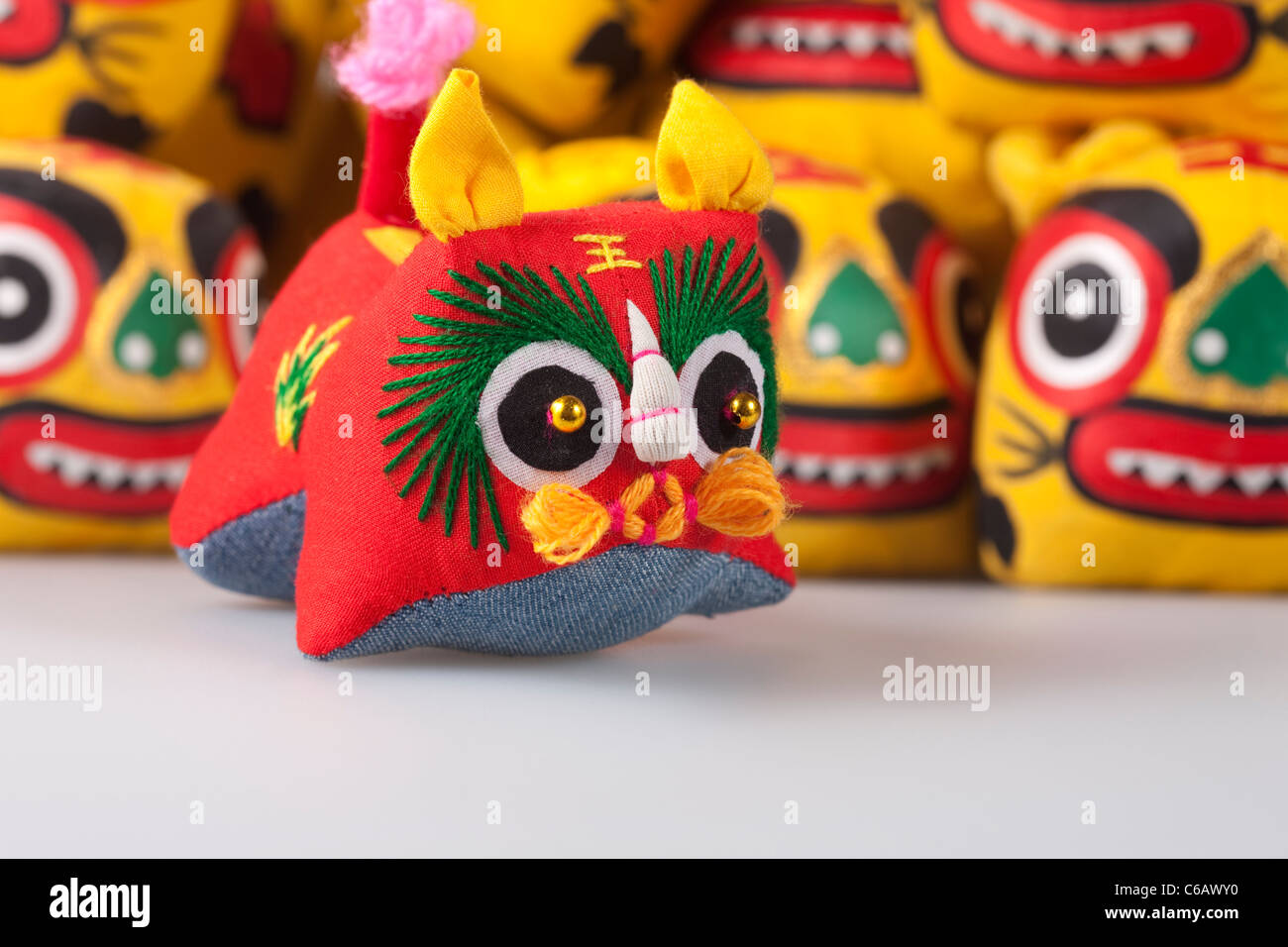 Close-up of red Chinese tiger stuffed animal Stock Photo - Alamy