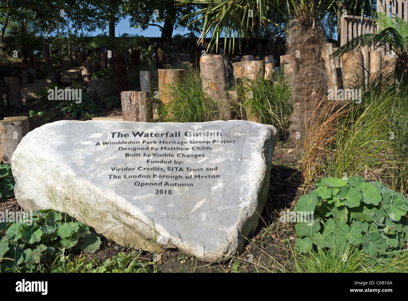 inscribed rock marking the waterfall garden in wimbledon park ...