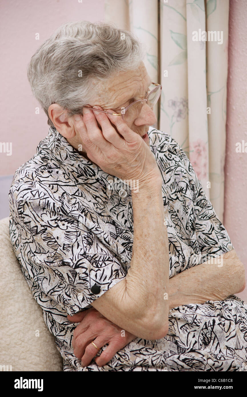 vulnerable elderly woman looking & feeling worried Stock Photo - Alamy