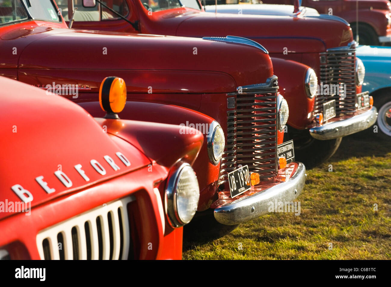 old restored red trucks Stock Photo - Alamy