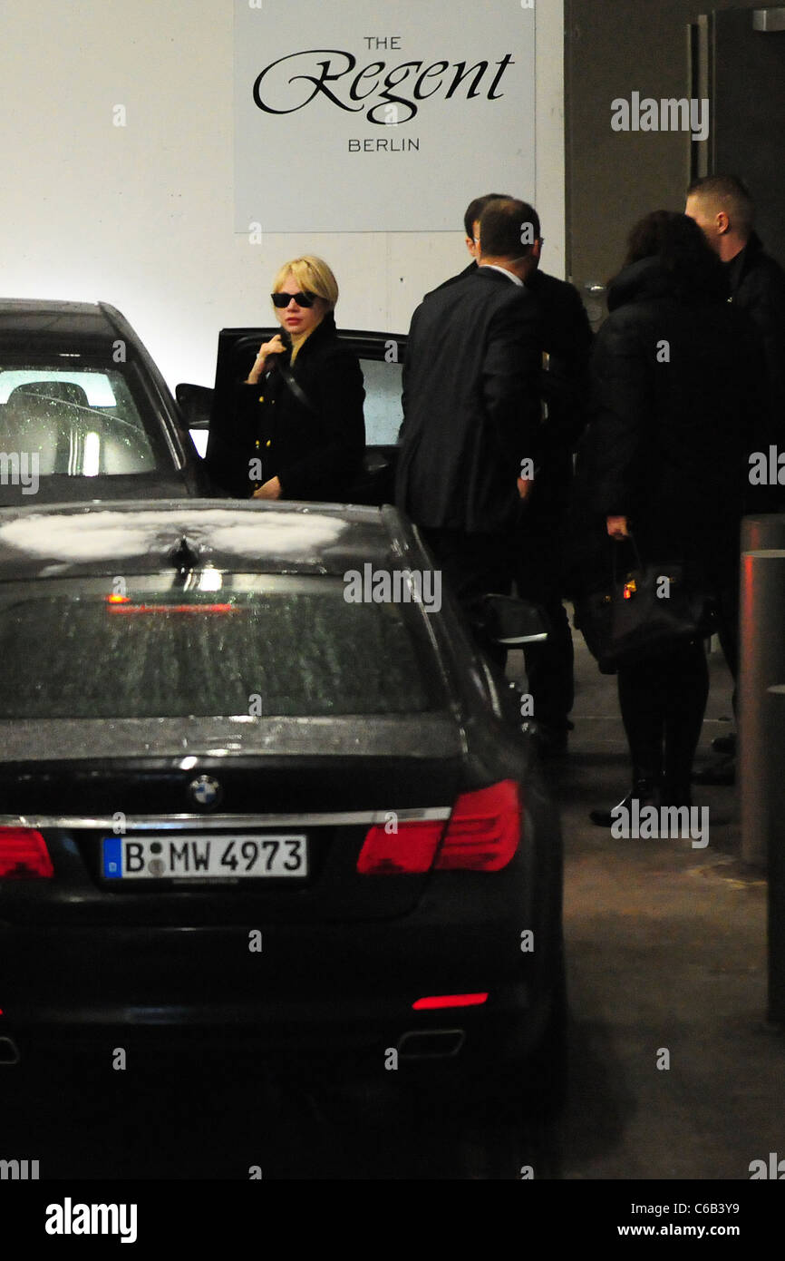 Michelle Williams arriving at Regent Hotel's parking garage. Berlin ...