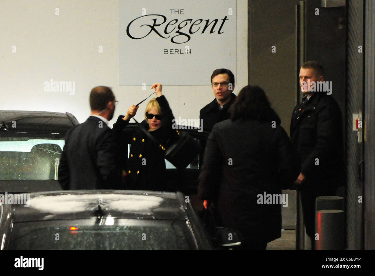 Michelle Williams arriving at Regent Hotel's parking garage. Berlin ...