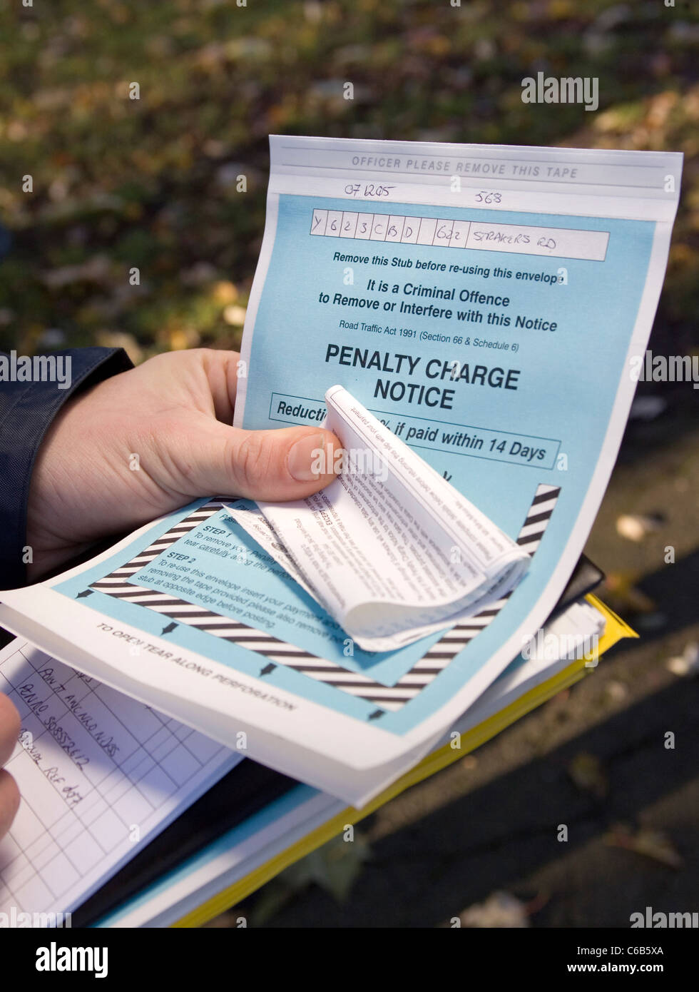 A penalty notice charge (Parking ticket) being issued to a car. London ...