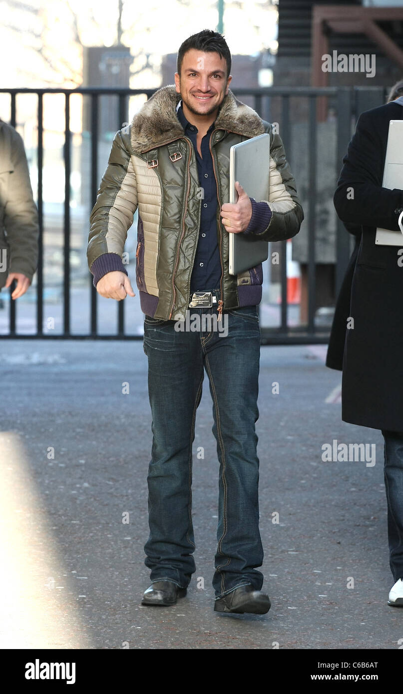 Peter Andre carrying his laptop outside the 'GMTV' studios London ...