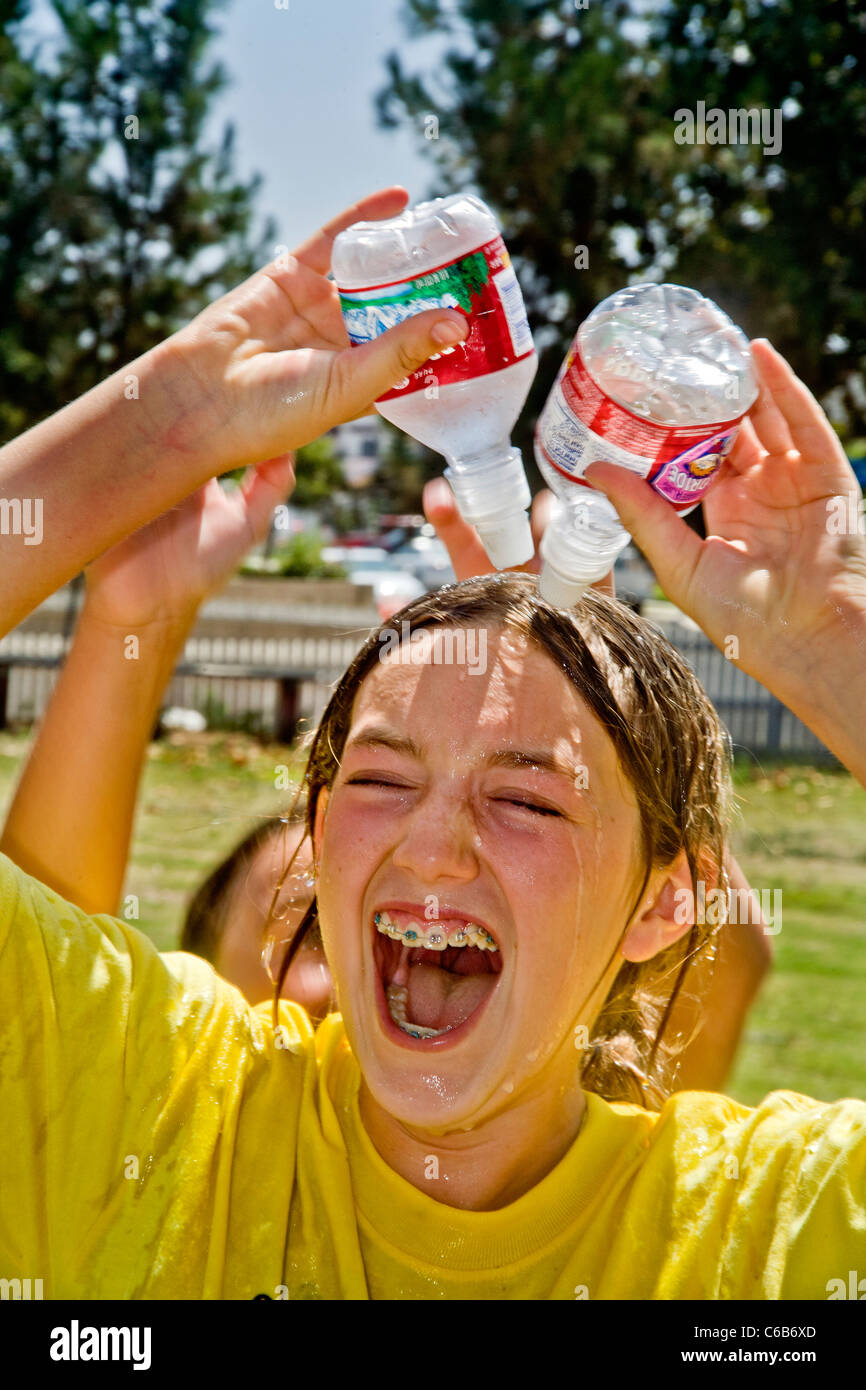 Teen girls pour cold water hi-res stock photography and images - Alamy