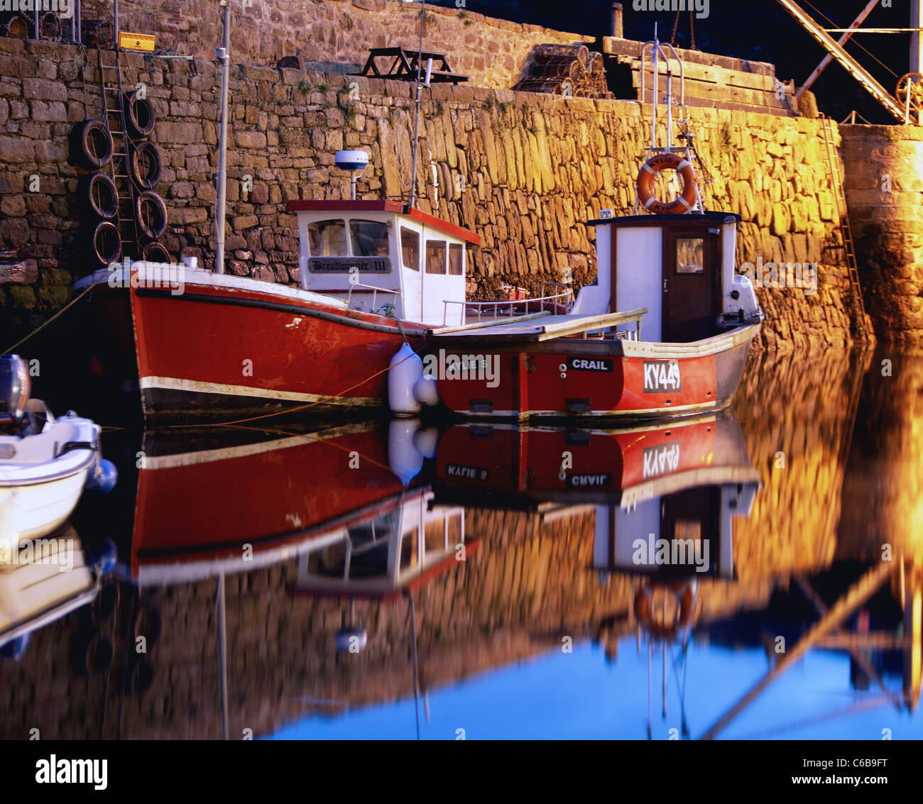 Boats in Crail Harbour Stock Photo - Alamy