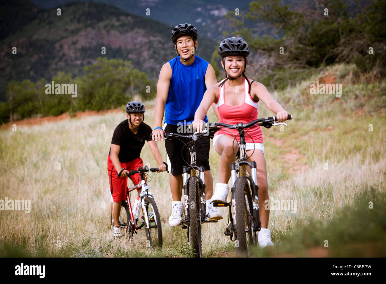 Asian friends biking hi-res stock photography and images - Alamy