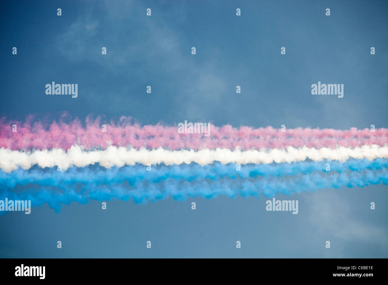 Contrails from the Red Arrows display team Stock Photo - Alamy