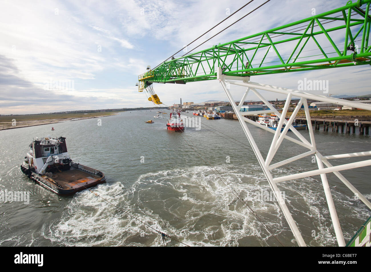 A tug boat towing a jack up barge, the Goliath, out to work on the ...