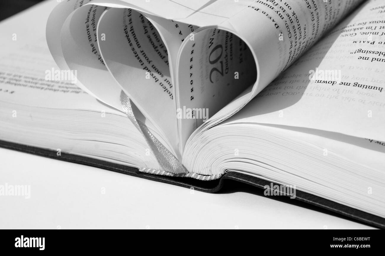 bible heart from pages within Stock Photo - Alamy