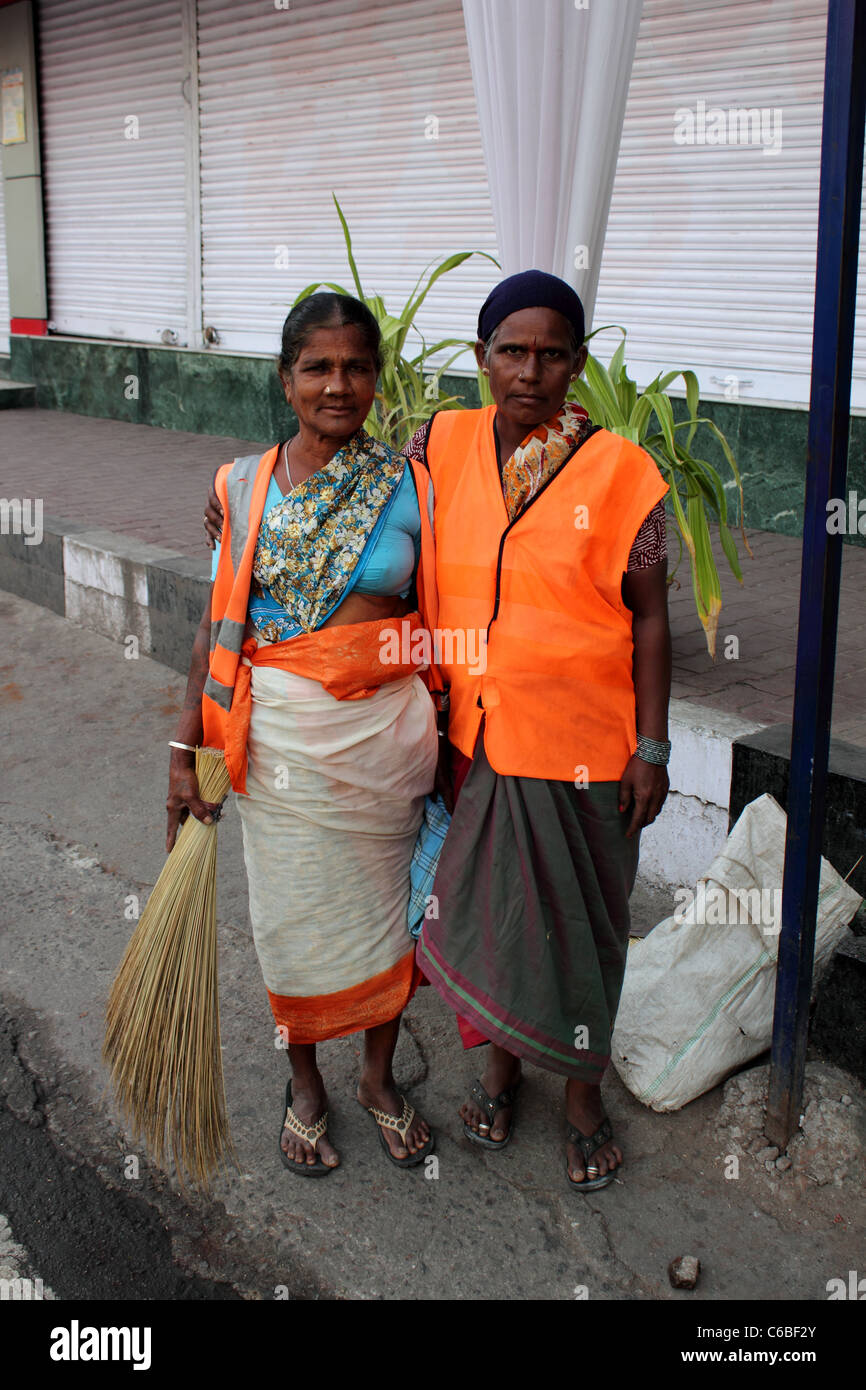 Indian woman working as a road sweeper hi-res stock photography and ...
