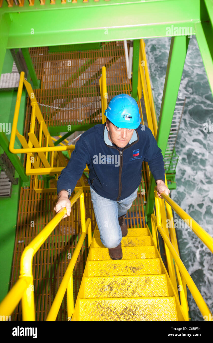A crane operator on the jack up barge, The Goliath at the Walney ...
