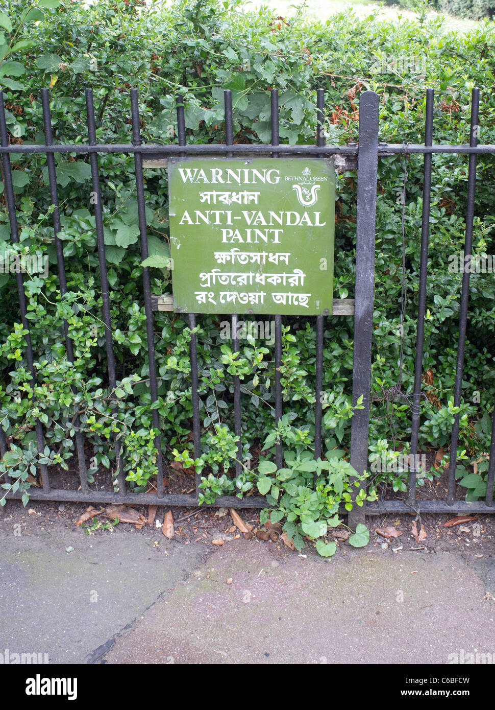 A sign warning of anti vandal paint in use displayed in English and ...