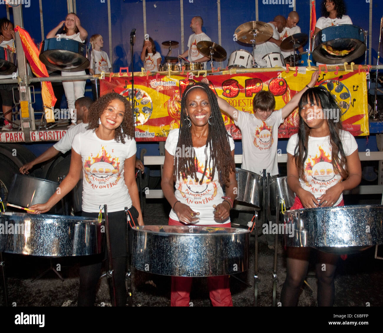 Band member from Rapso Steel Orchestra, Pan on Fire, playing steel drum ...