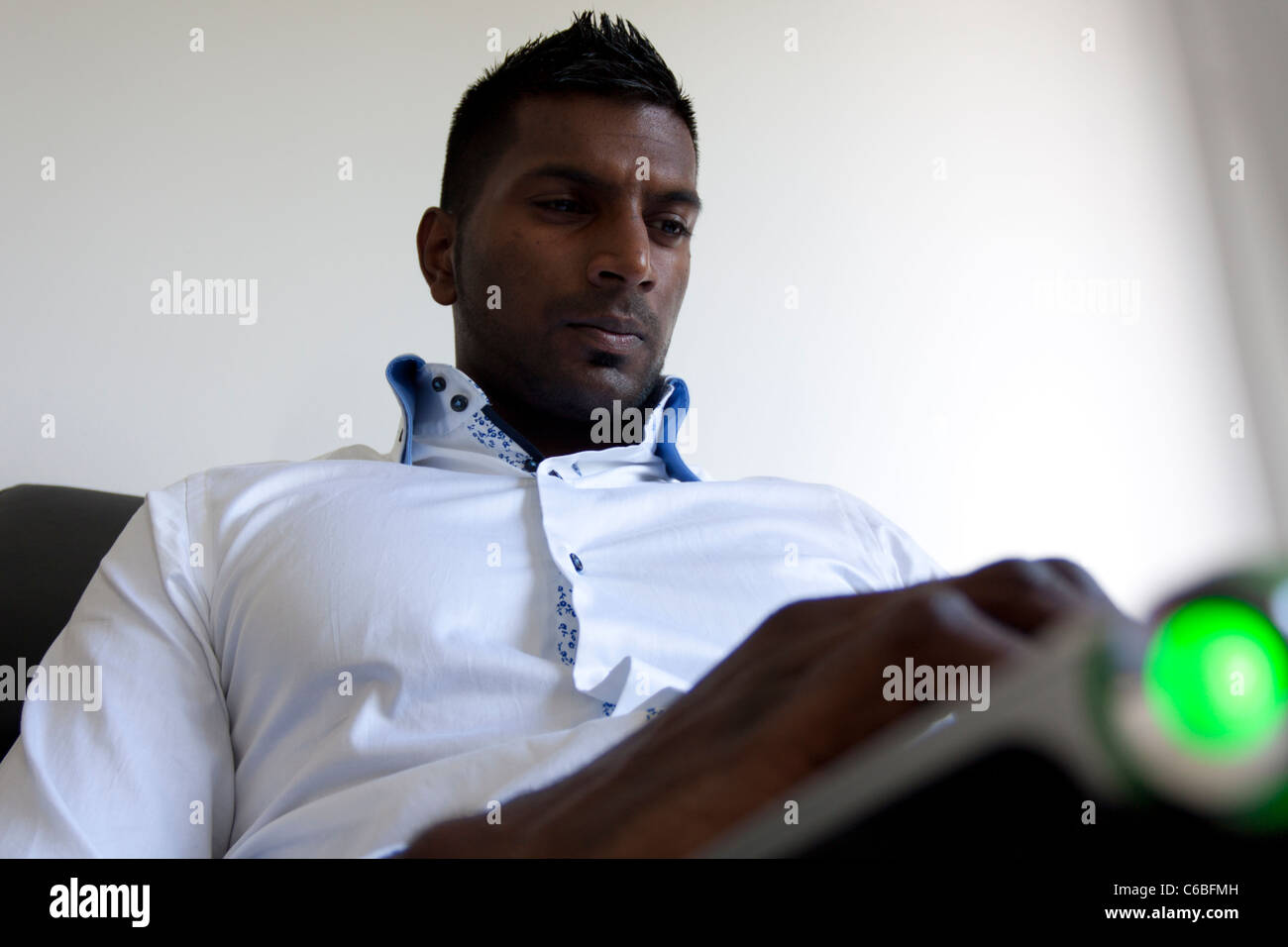Indian man working on his personal computer Stock Photo - Alamy