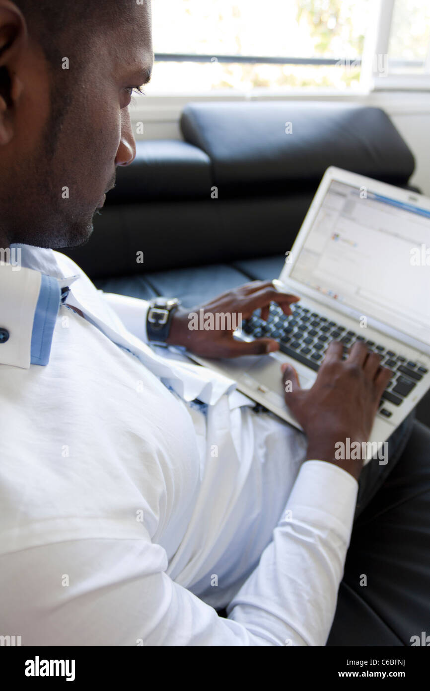Indian man working on his personal computer Stock Photo - Alamy