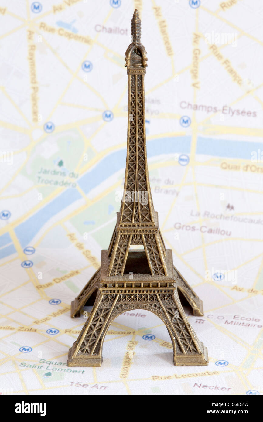 Eiffel Tower on map of Paris Stock Photo - Alamy