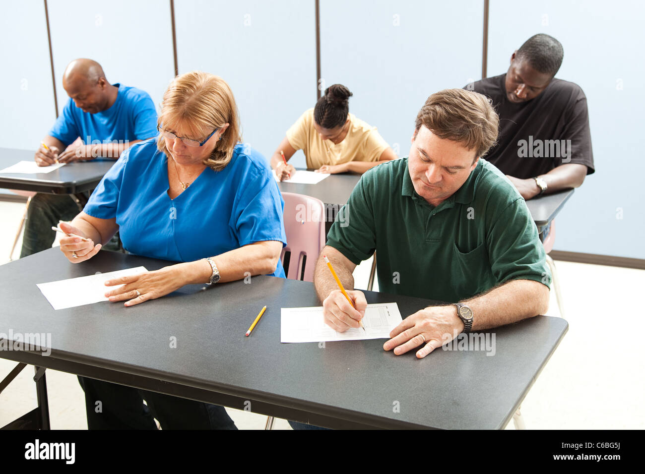 Students taking a test diversity hi-res stock photography and images ...