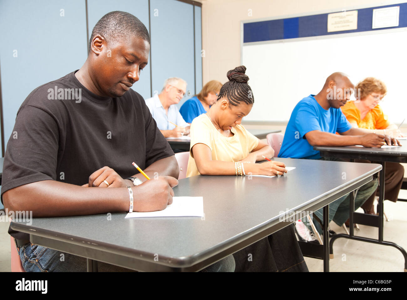 Ethnic students taking test hi-res stock photography and images - Alamy