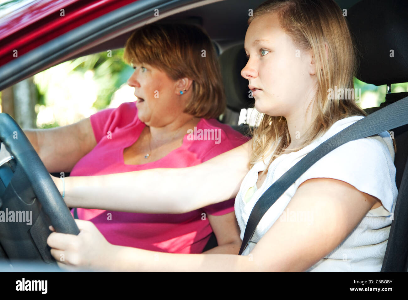 Teenage driver and her mother about to have a car accident Stock Photo ...