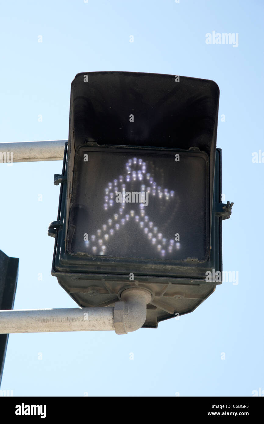 low energy led white man cross pedestrian crossing sign in downtown ...