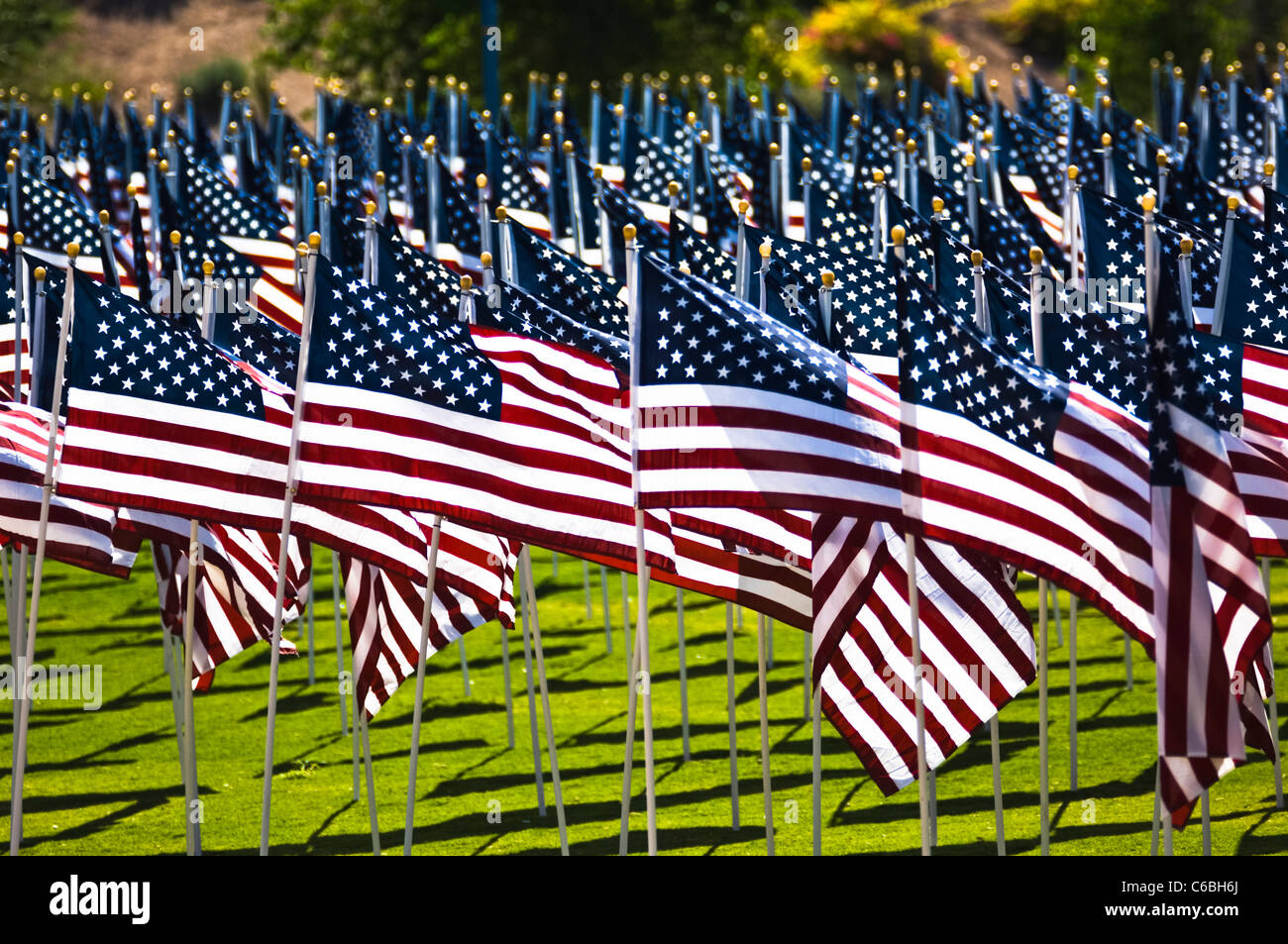 Hundreds of U.S.A. flags set up for a 911 program at Tempe Town Lake ...