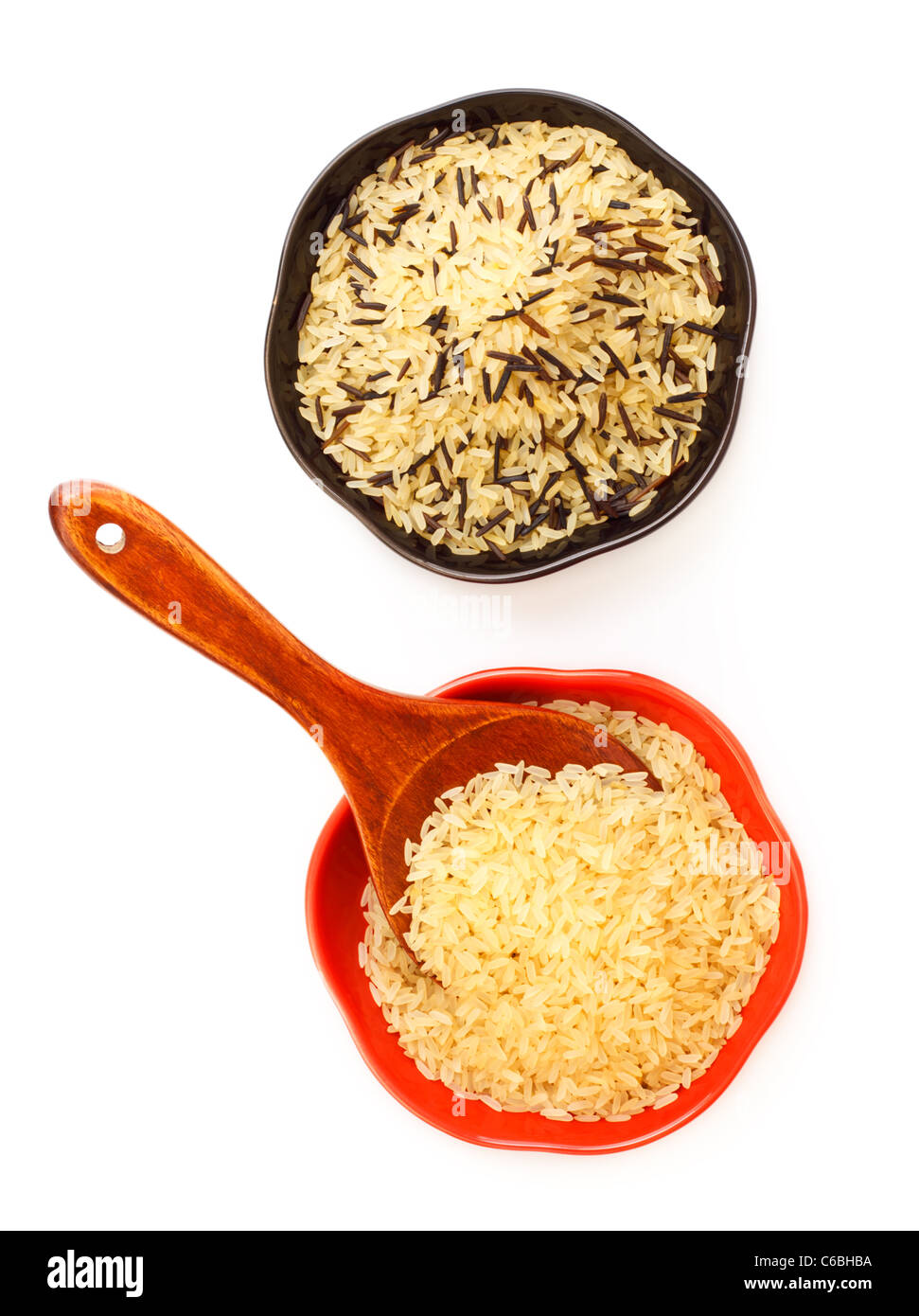 two bowls with rice and wooden spoon Stock Photo - Alamy