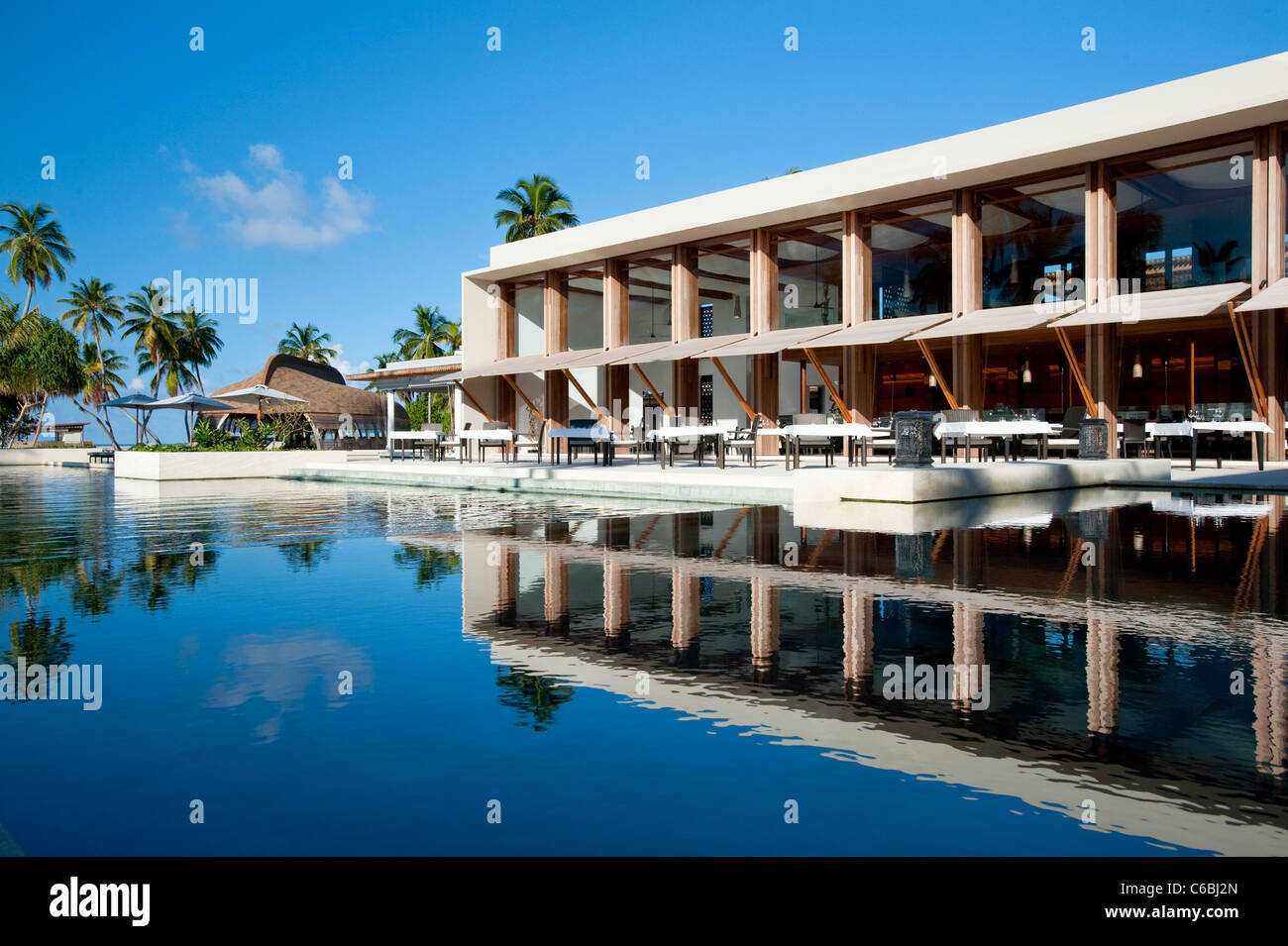 Swimming pool next to the restaurant at the Alila Villas Hadahaa Resort ...