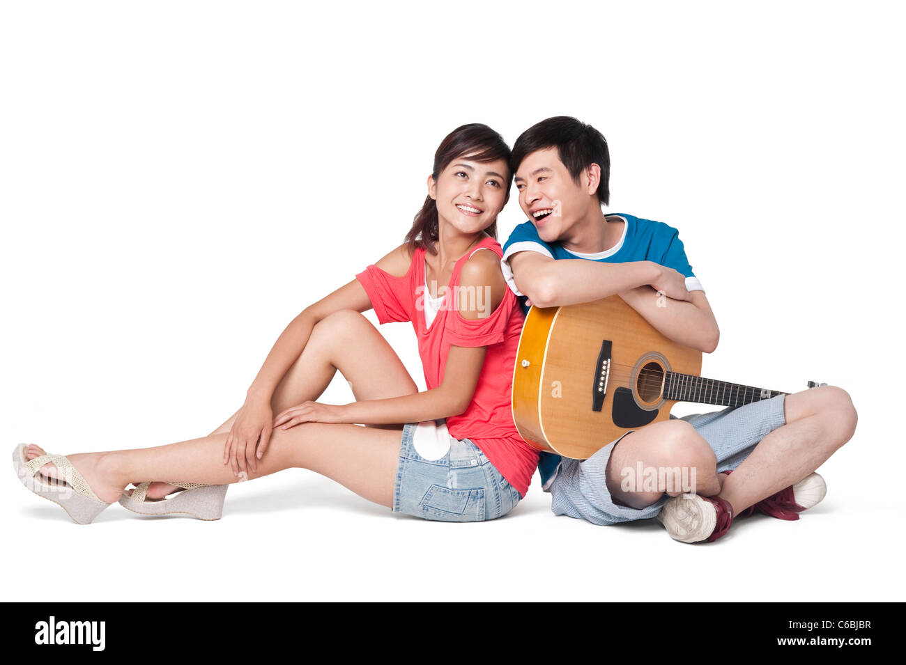 Studio shot of a boyfriend and girlfriend sharing a moment Stock Photo ...