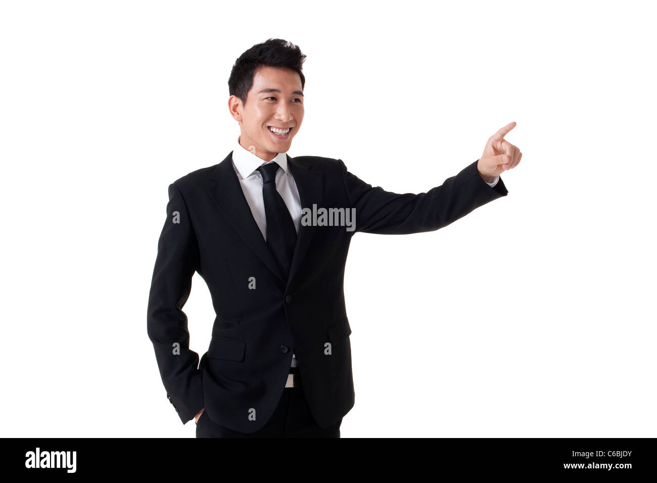 Businessman pointing the front Stock Photo - Alamy