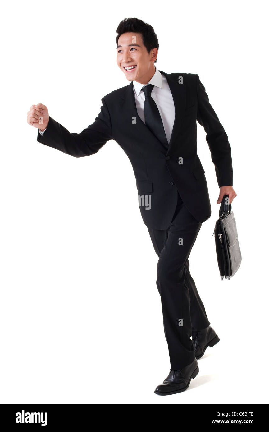 Businessman on the move Stock Photo - Alamy