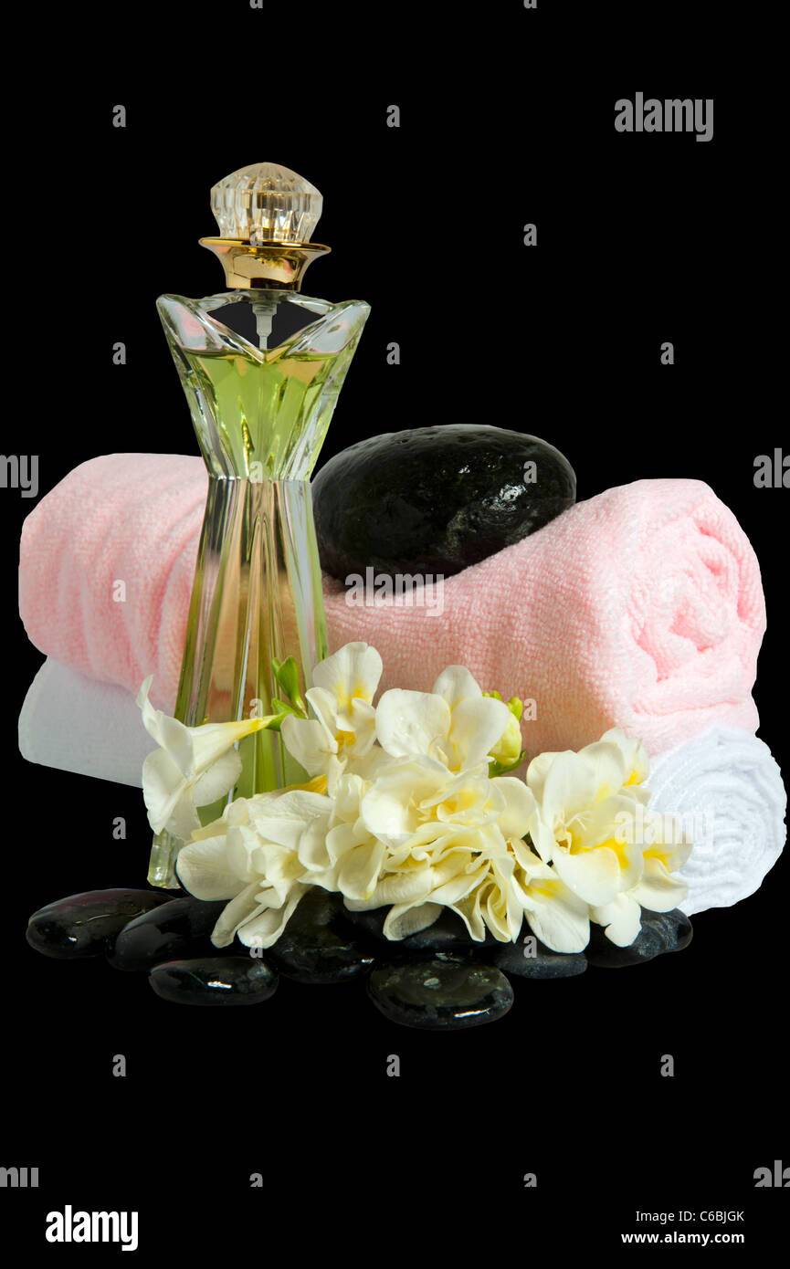 Perfume,Rocks, flowers, fans and towels on white background Stock Photo ...
