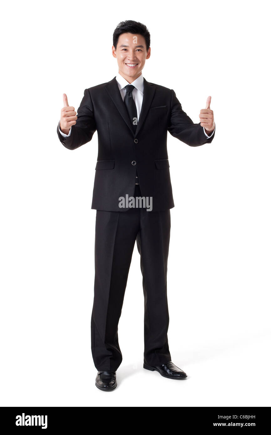 Portrait young man doing thumbs Cut Out Stock Images & Pictures - Alamy