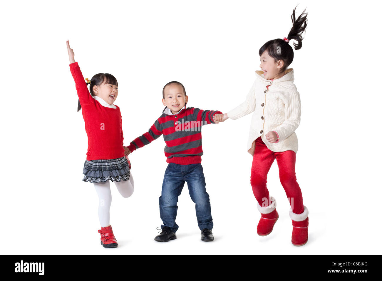 Three Chinese children playing Stock Photo - Alamy