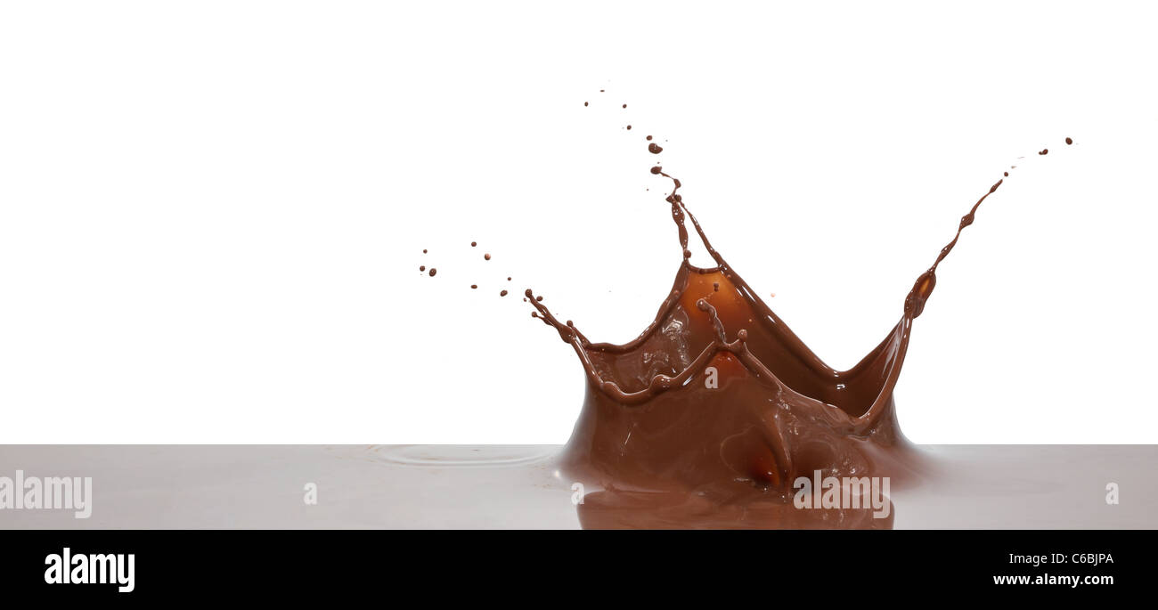 chocolate splash closeup isolated on white background Stock Photo - Alamy