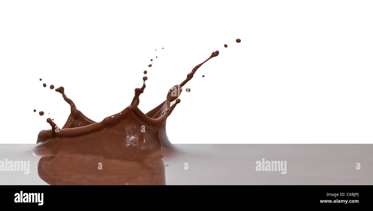 chocolate splash closeup isolated on white background Stock Photo - Alamy