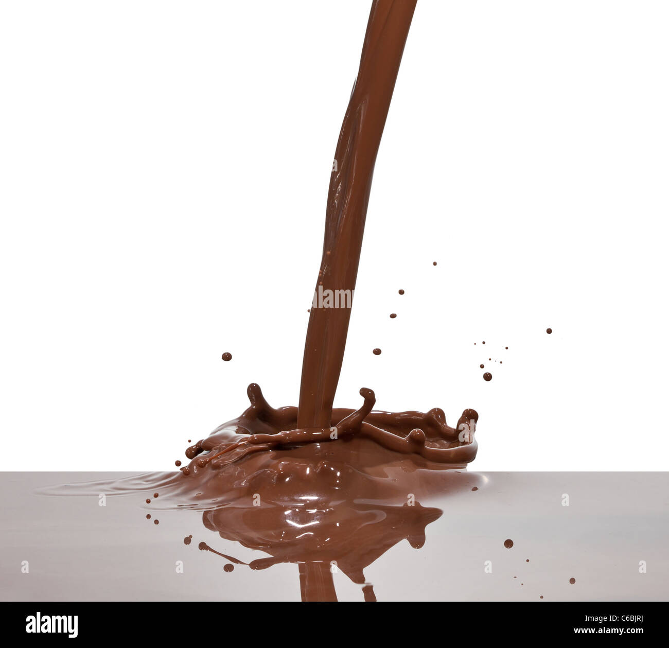 chocolate splash closeup isolated on white background Stock Photo - Alamy