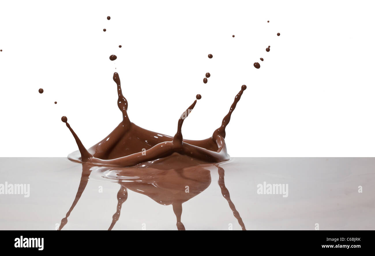 chocolate splash closeup isolated on white background Stock Photo - Alamy