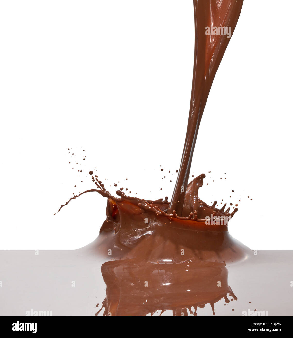 chocolate splash closeup isolated on white background Stock Photo - Alamy