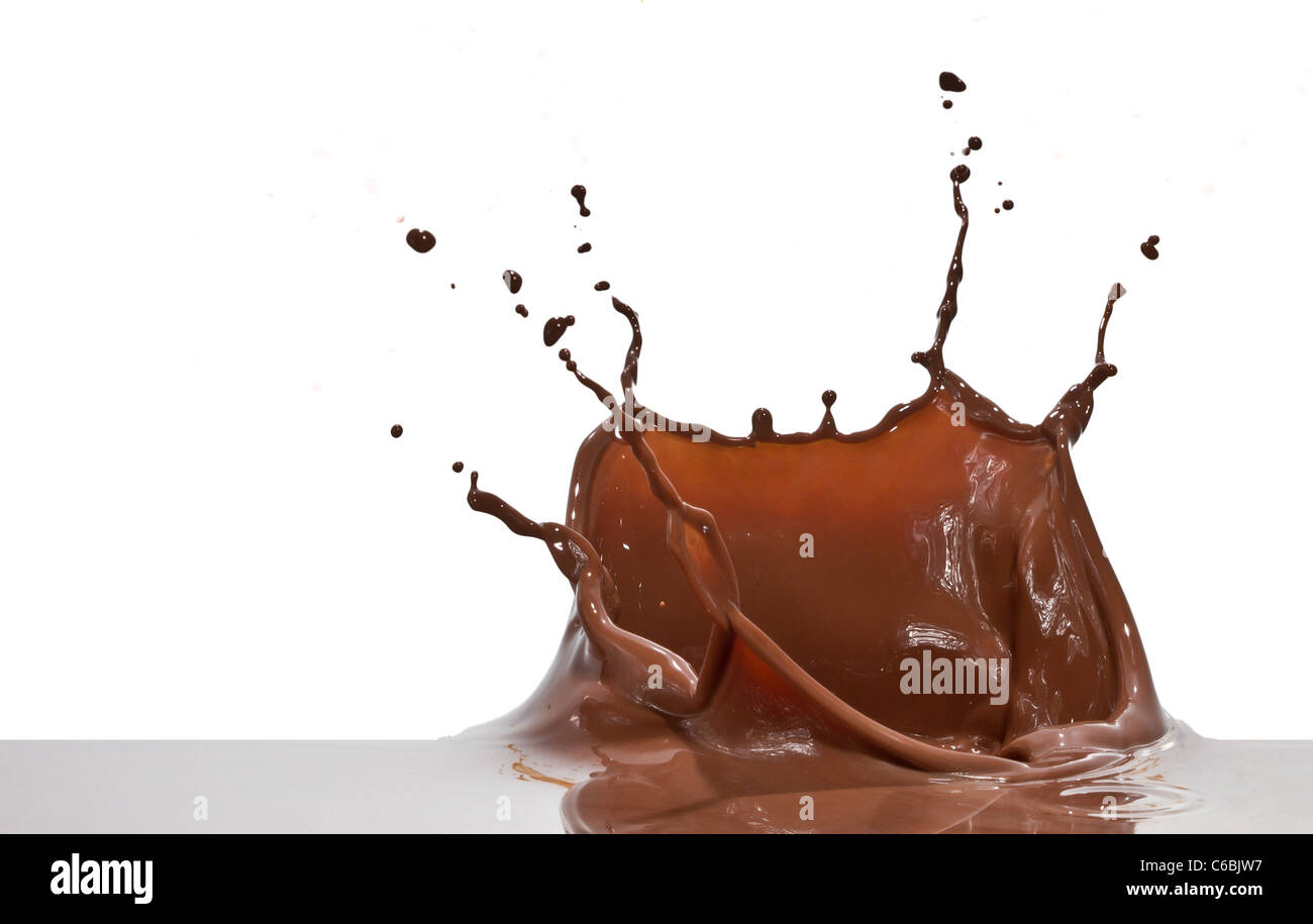 chocolate splash closeup isolated on white background Stock Photo - Alamy