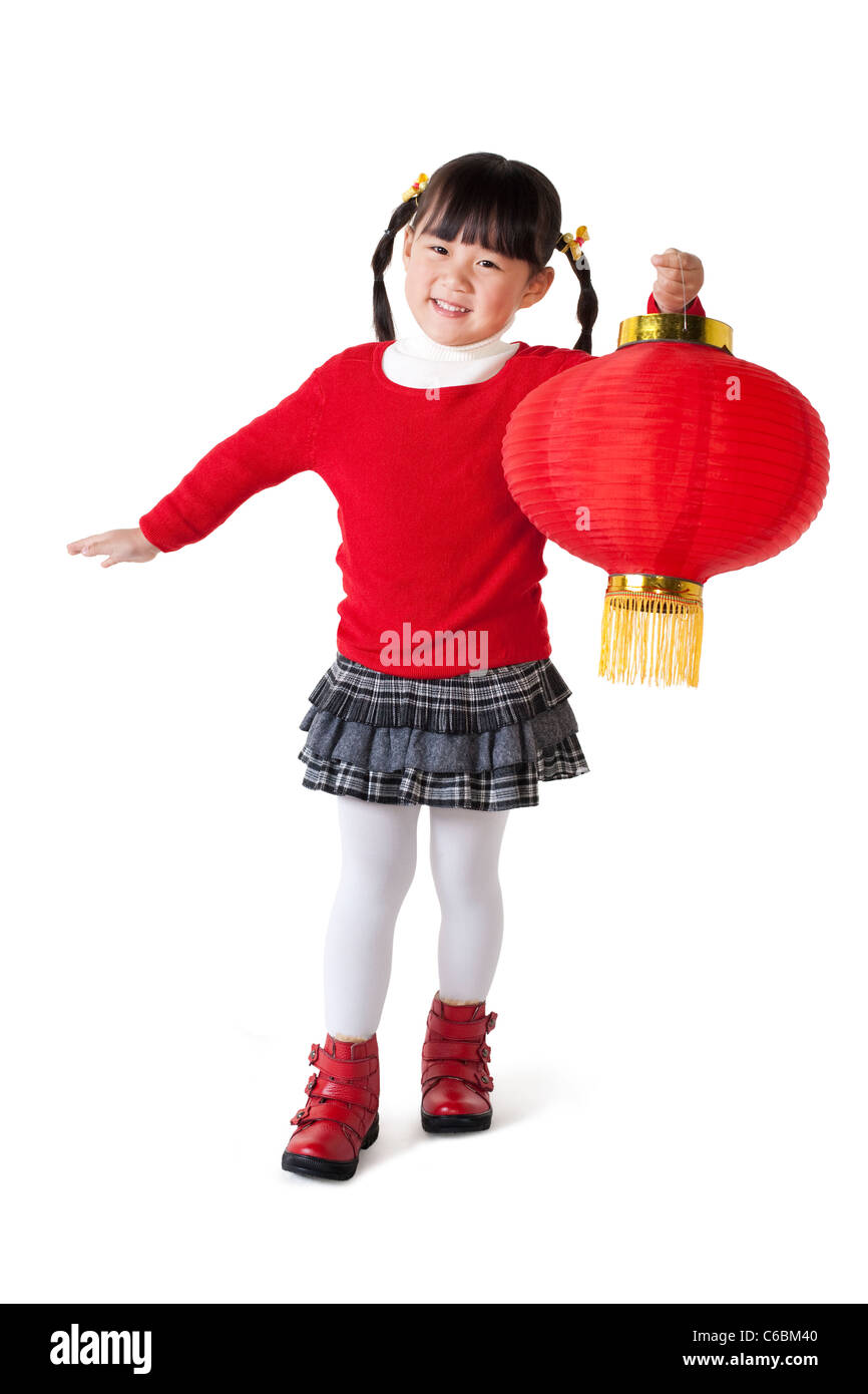 Cute Chinese girl holding lantern aloft Stock Photo - Alamy