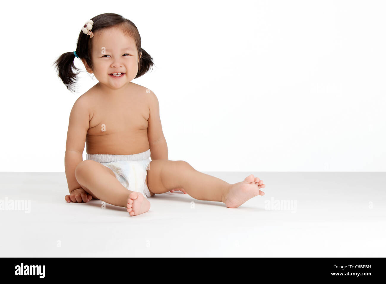 Studio shot of a cute baby girl Stock Photo - Alamy