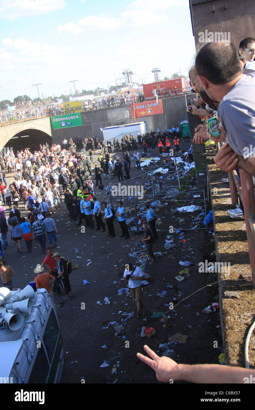 Victims are covered at the Love Parade 2010 after 19 people died and ...