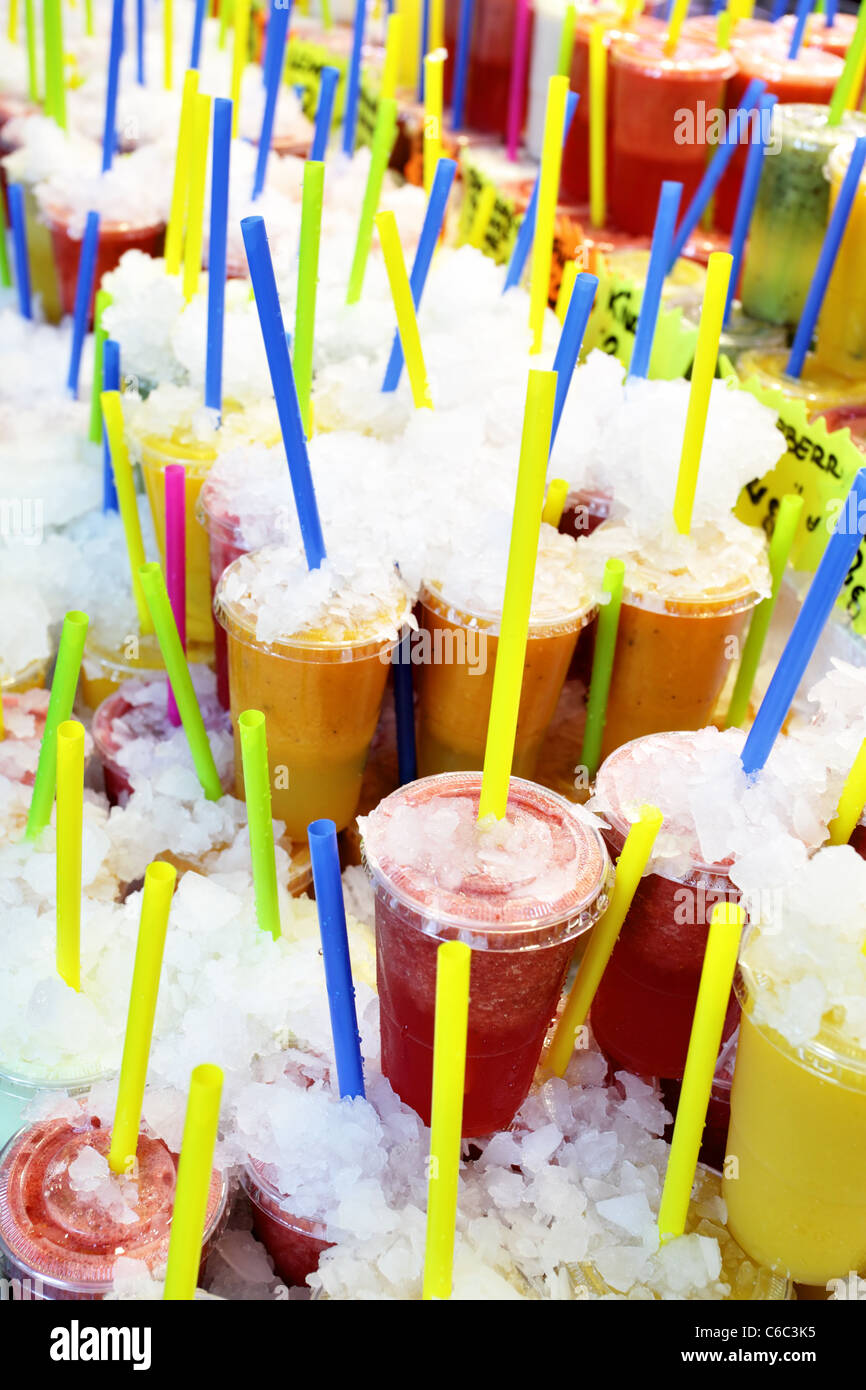 Colorful fruit cocktails at market stall close-up Stock Photo - Alamy