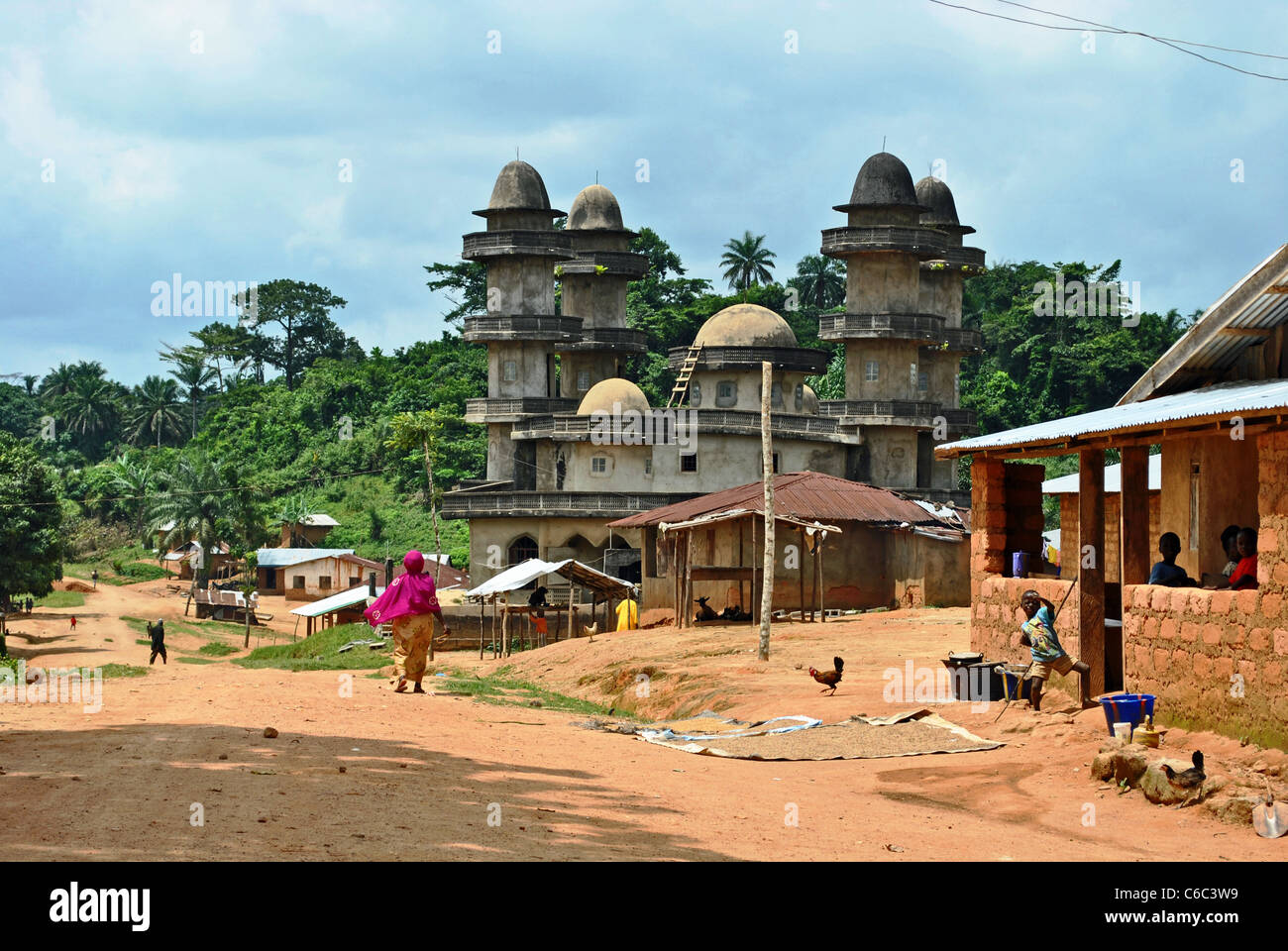 Village with mosque, between Kolahun and Bolahun in Lofa County ...