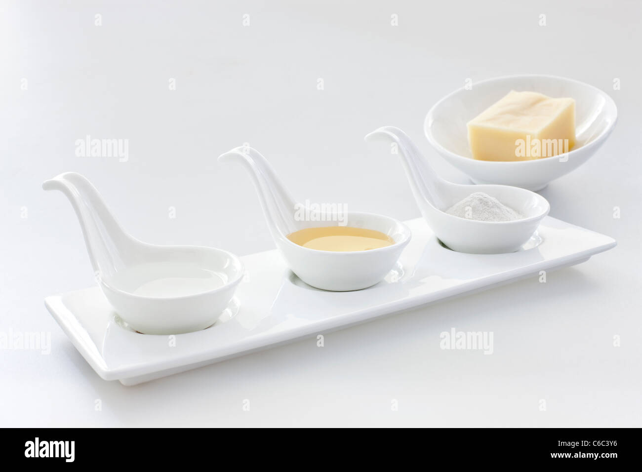 Spoons and cheese Stock Photo - Alamy