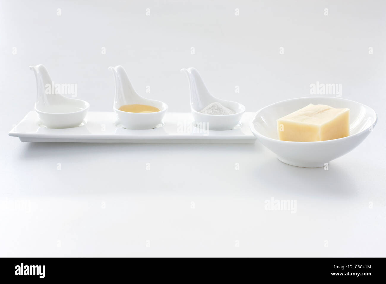 Spoons and cheese Stock Photo - Alamy