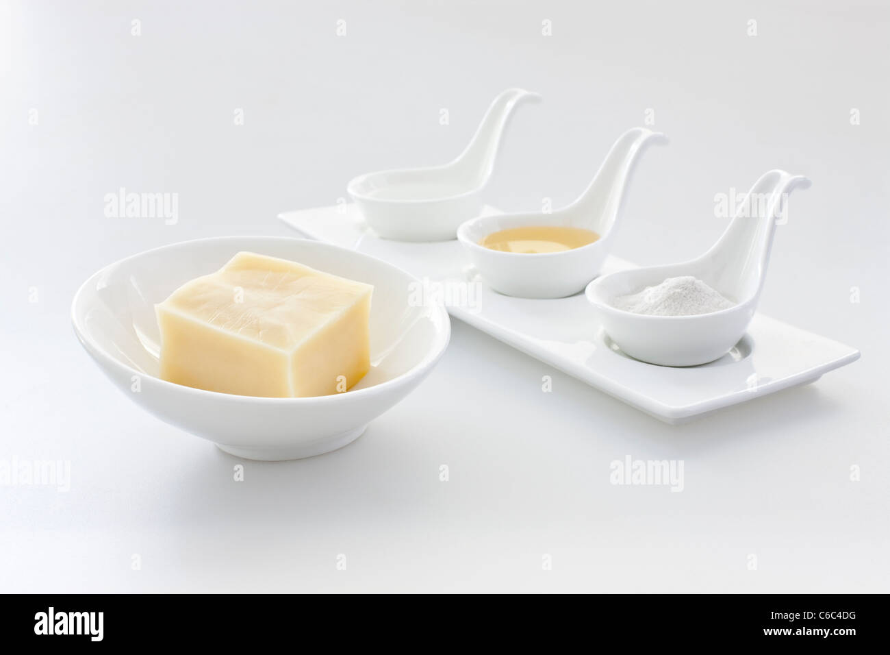 Spoons and cheese Stock Photo - Alamy